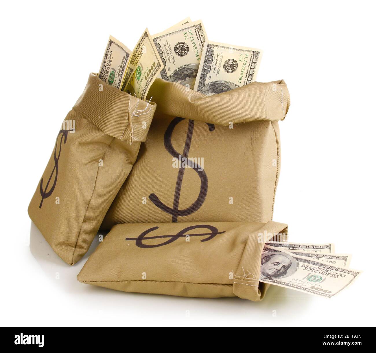 Bags with money isolated on white Stock Photo - Alamy