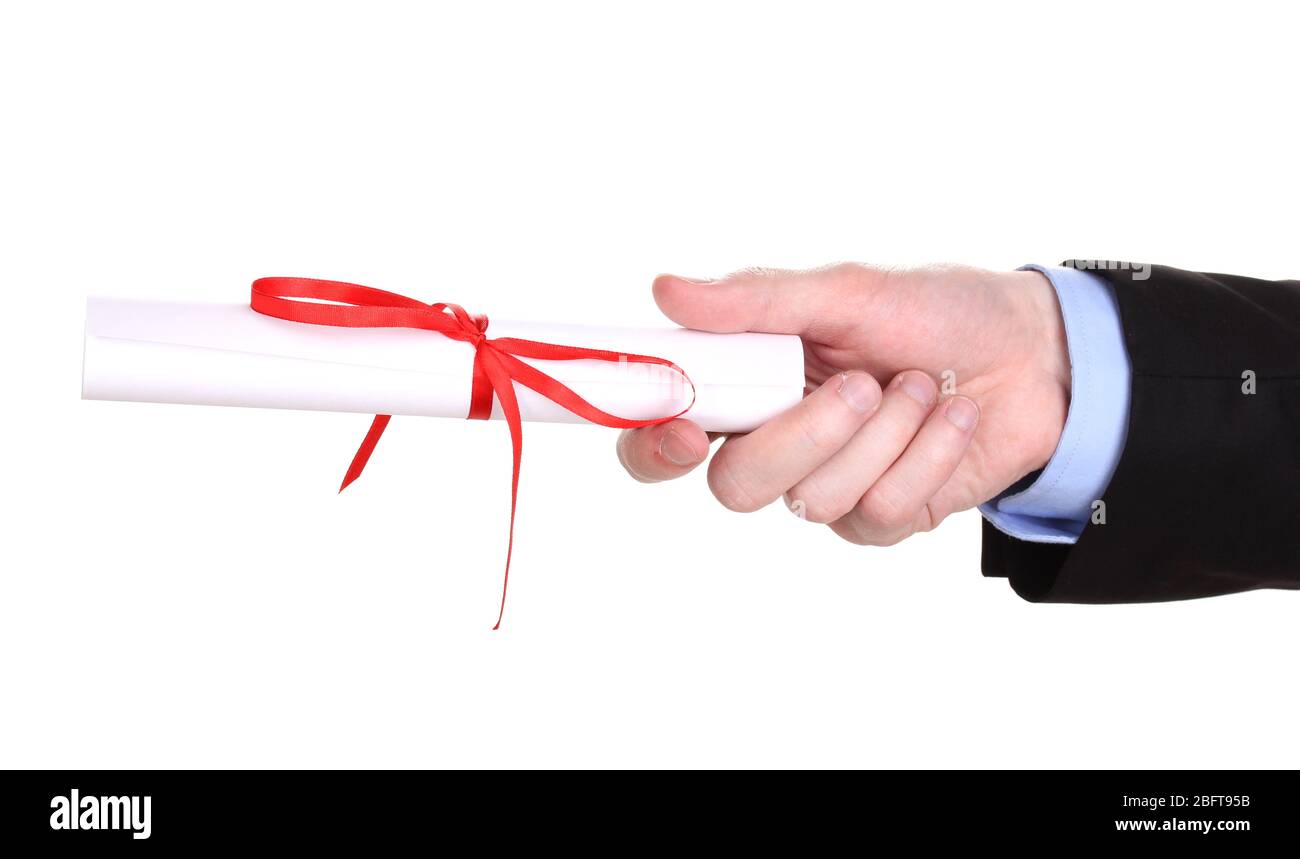 Graduation diploma in hand isolated on white Stock Photo - Alamy