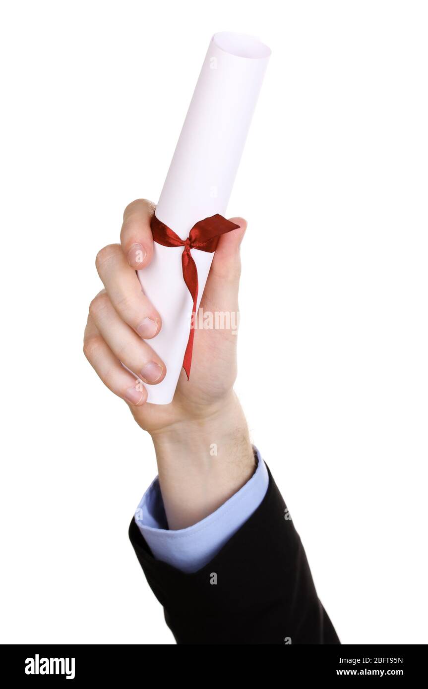 Graduation diploma in hand isolated on white Stock Photo - Alamy