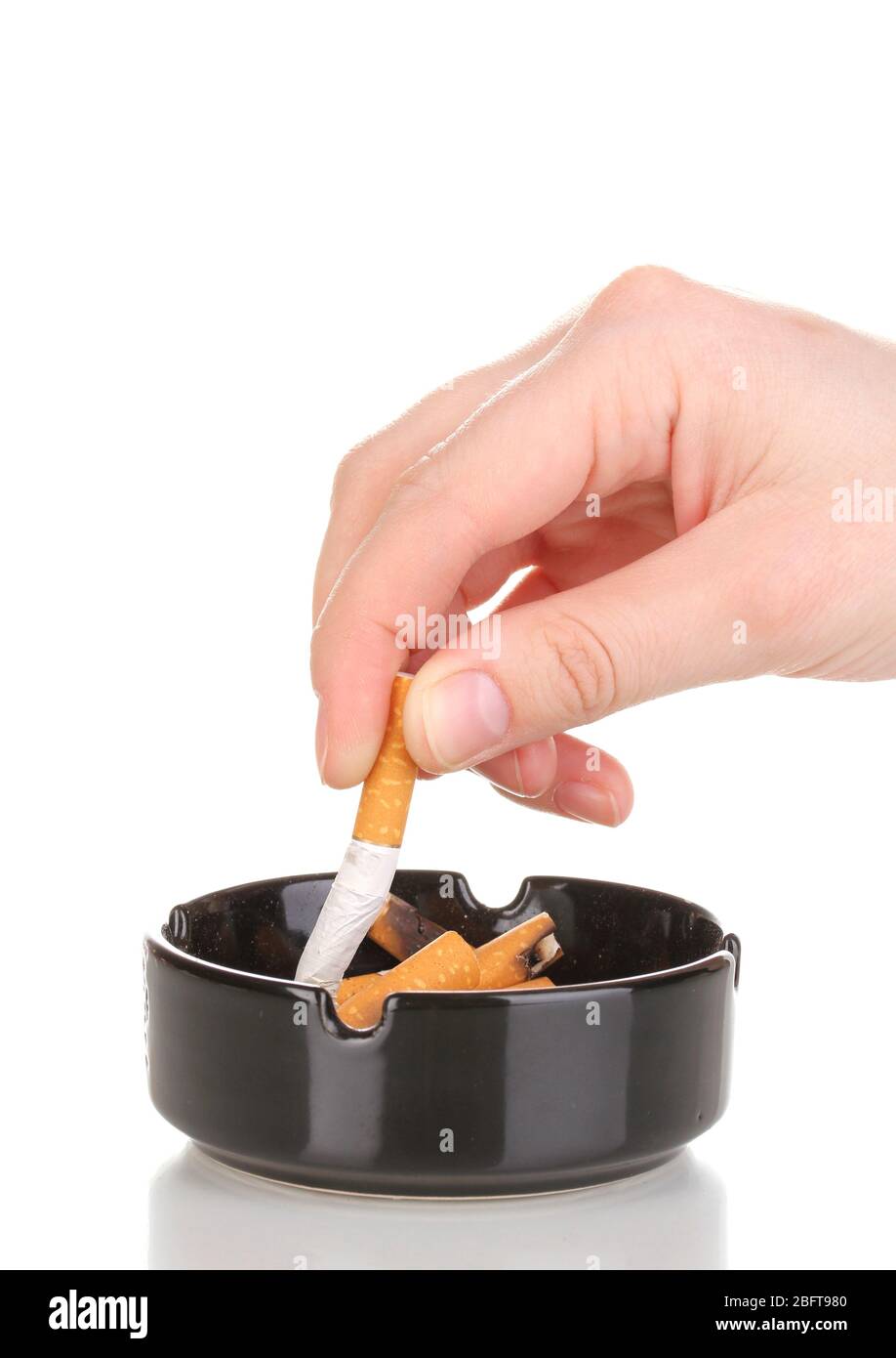 Putting out cigarette butt isolateed on white Stock Photo - Alamy