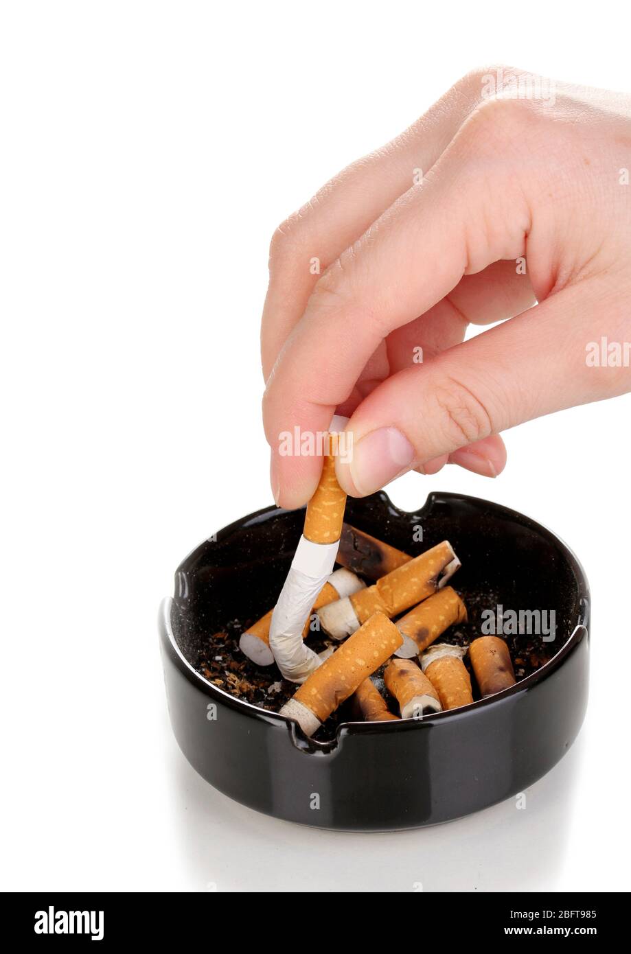 Putting out cigarette butt isolateed on white Stock Photo - Alamy