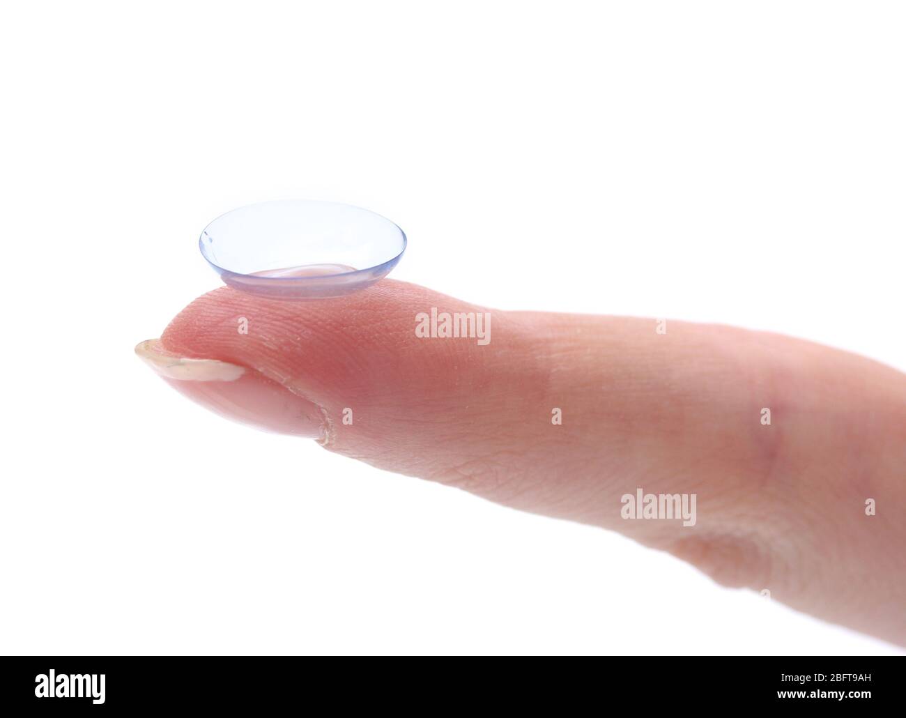 contact lens on finger isolated on white Stock Photo - Alamy