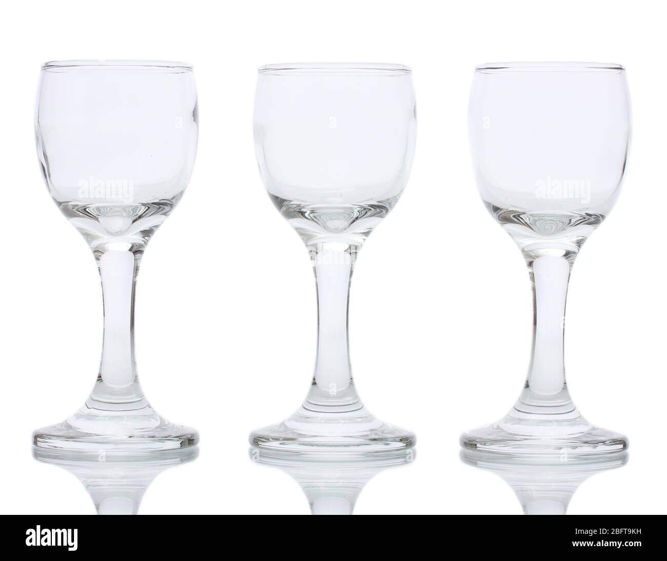 Empty glasses isolated on white Stock Photo - Alamy