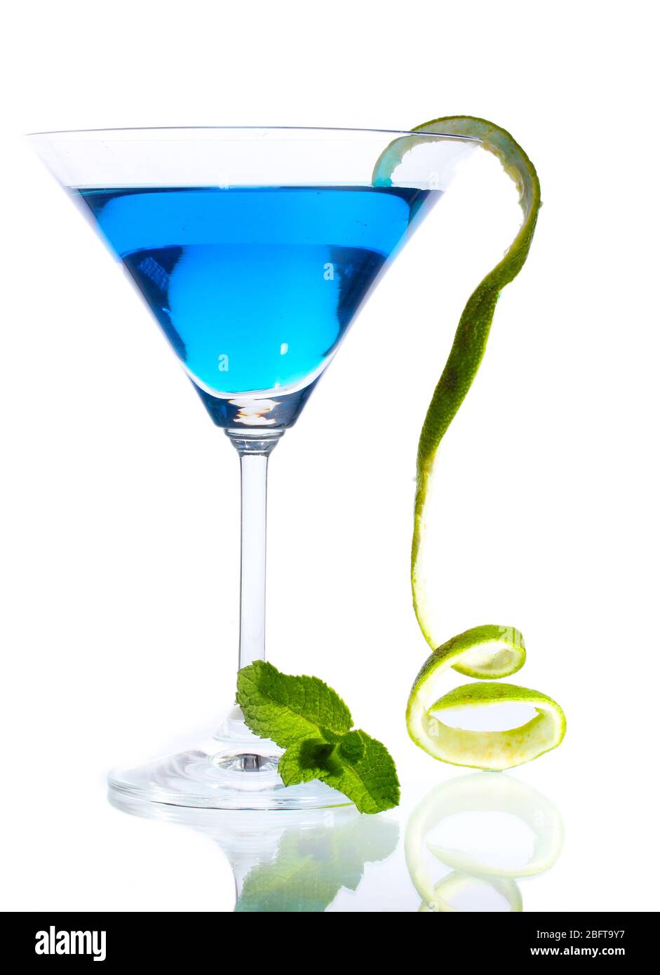 Blue cocktail in martini glass isolated on white Stock Photo - Alamy