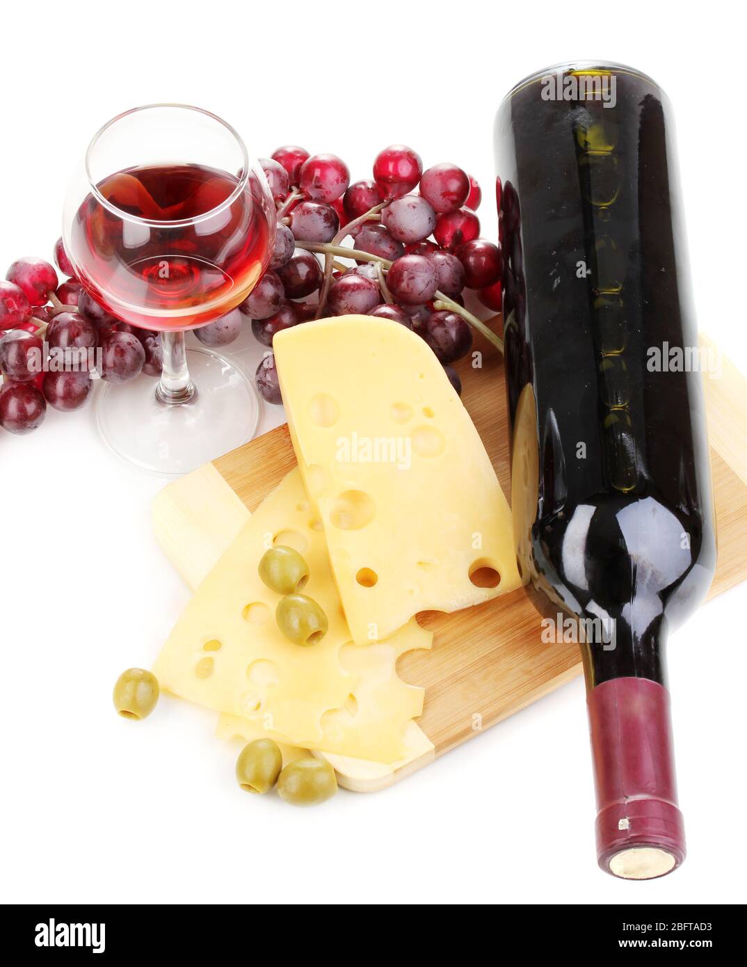 Bottle of great wine with wineglass and cheese isolated on white Stock ...