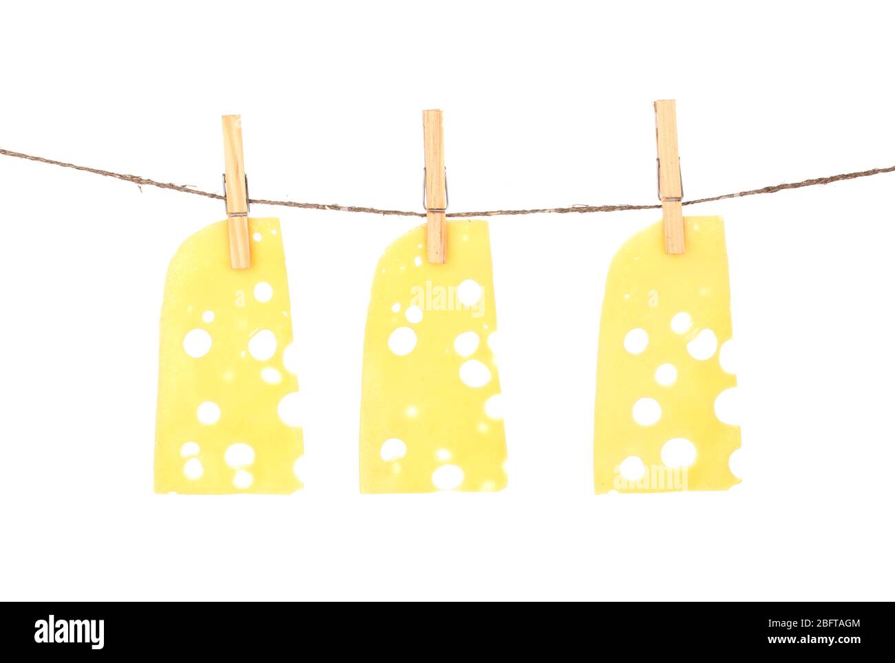 Cheese on rope isolated on white Stock Photo - Alamy