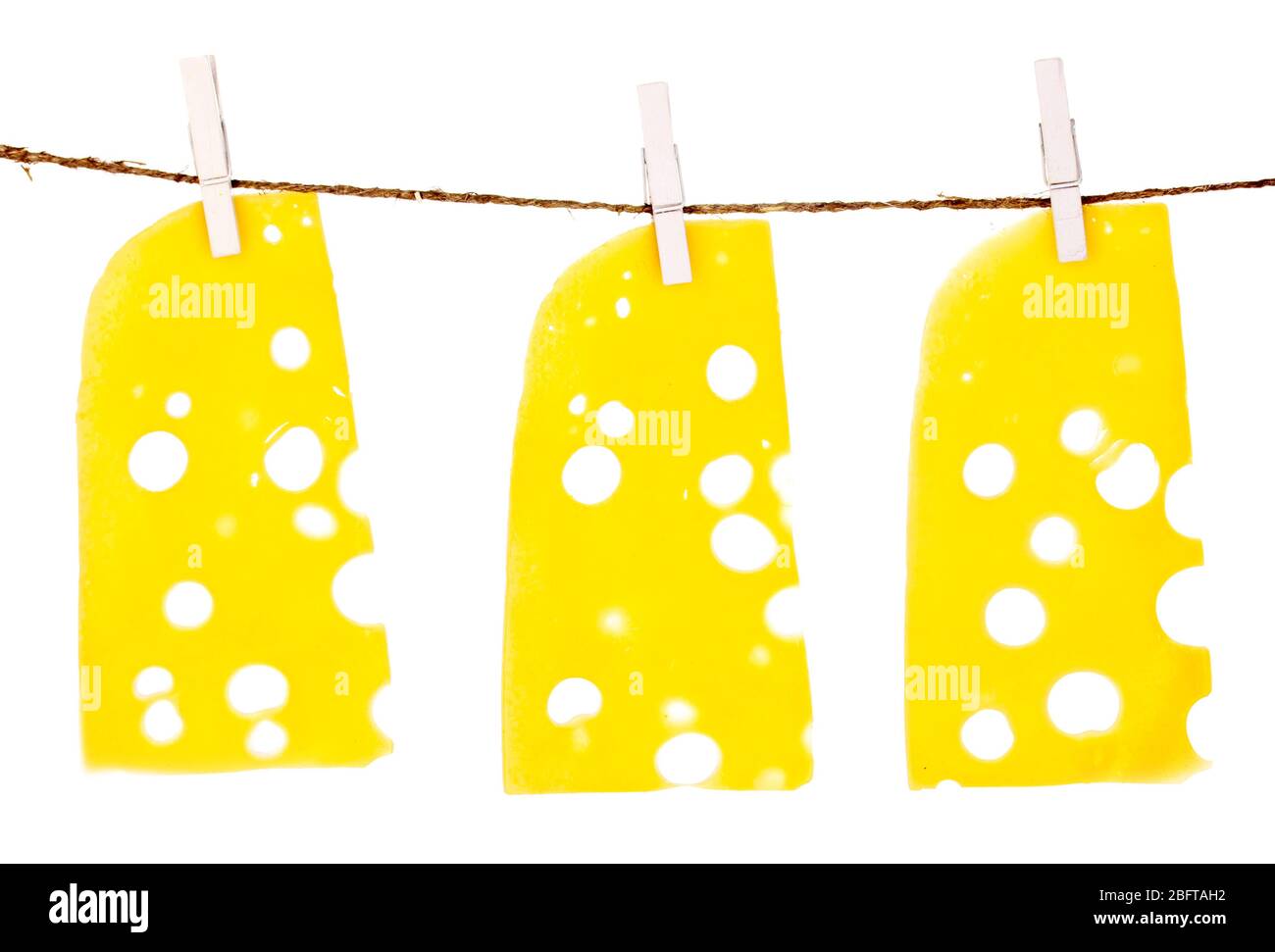 Cheese on rope isolated on white Stock Photo - Alamy