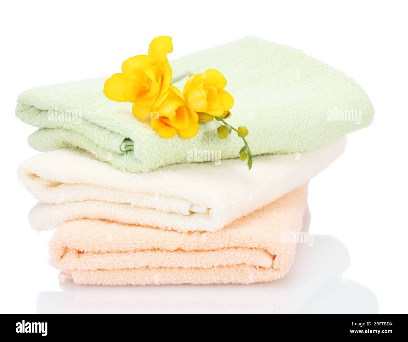 colorful towels and flowers isolated on white Stock Photo - Alamy