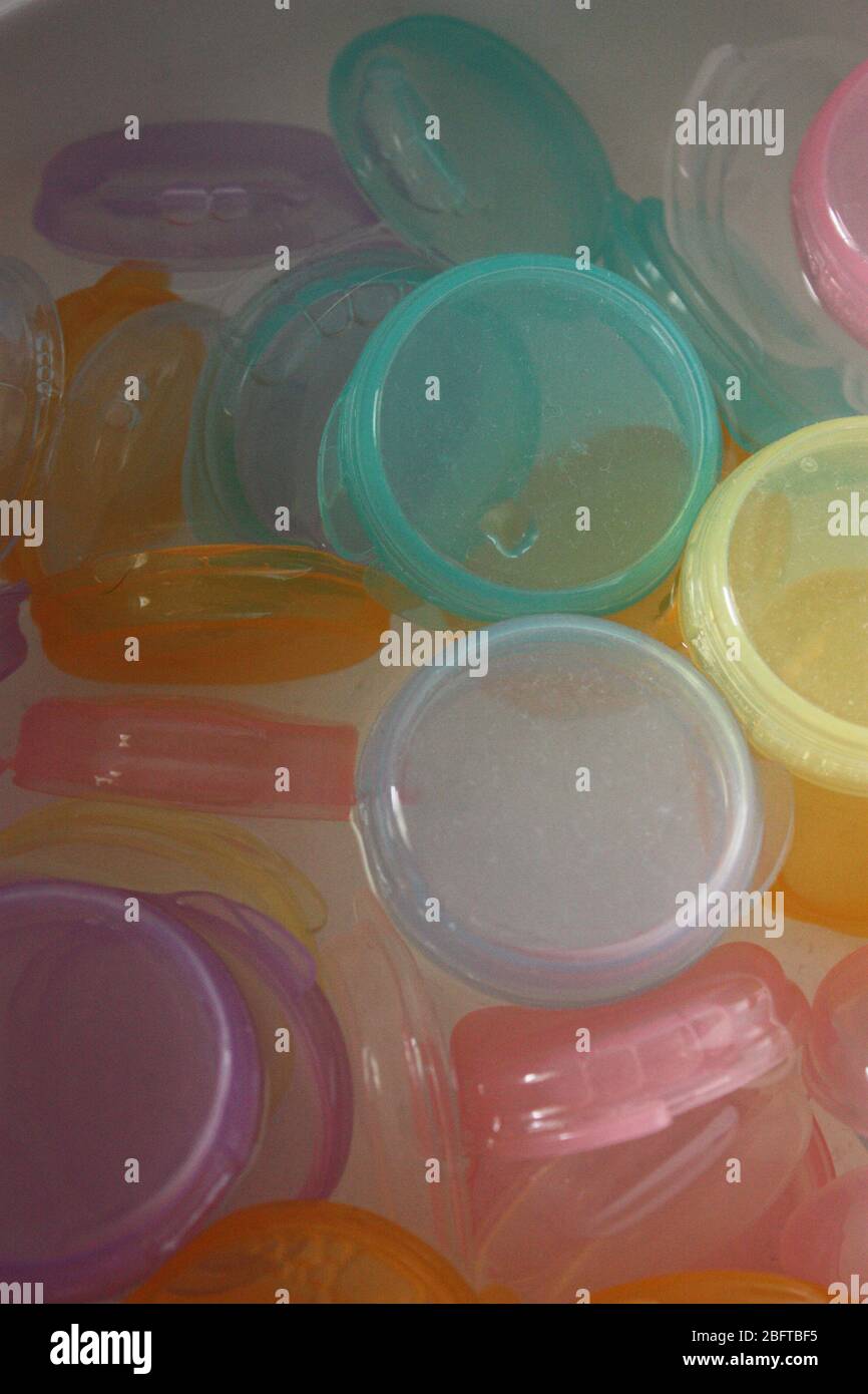 Small round plastic containers hi-res stock photography and images - Alamy