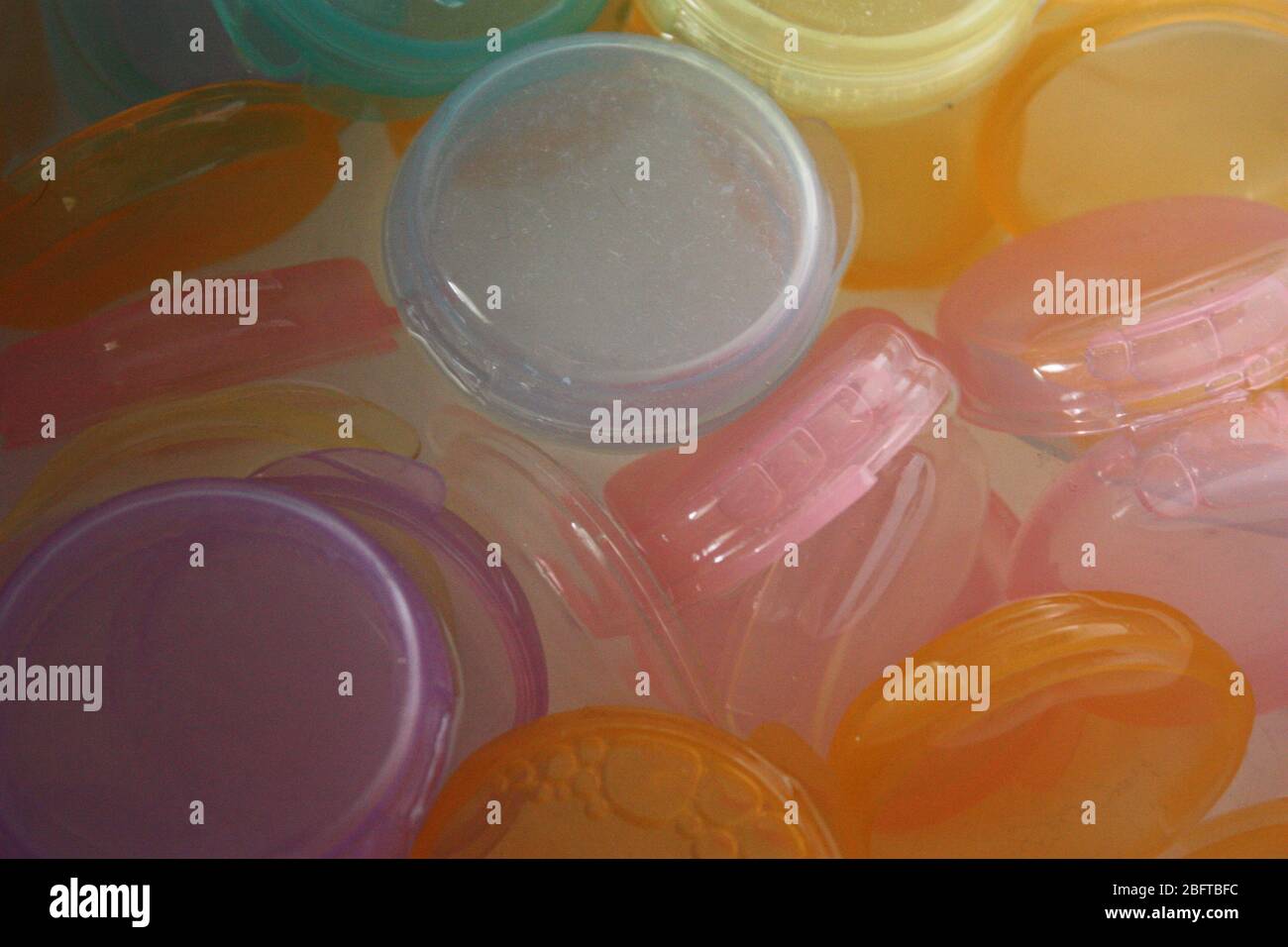 Small round plastic containers hi-res stock photography and images - Alamy