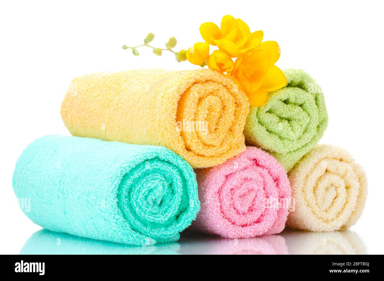 colorful towels and flowers isolated on white Stock Photo - Alamy