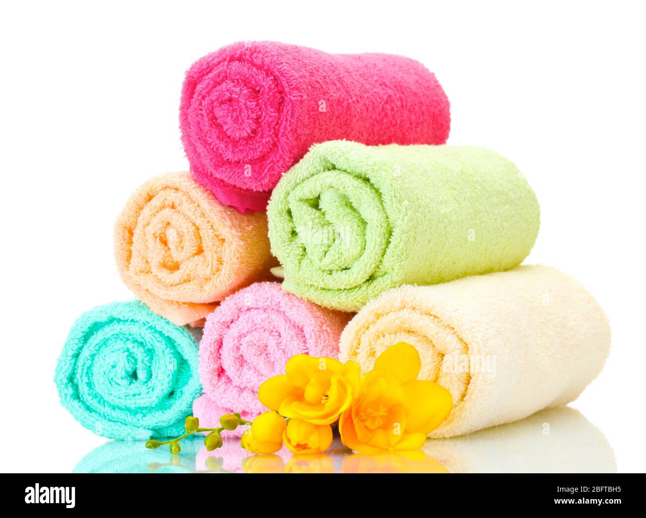 colorful towels and flowers isolated on white Stock Photo - Alamy