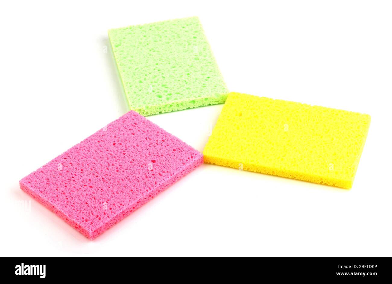 Cellulose sponges isolated on white Stock Photo - Alamy