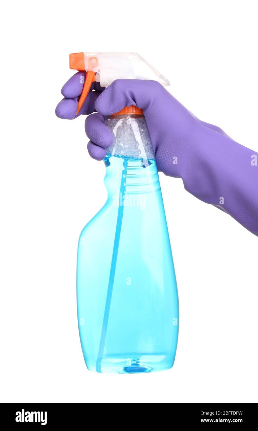 Cleaning spray in hand isolated on white Stock Photo - Alamy