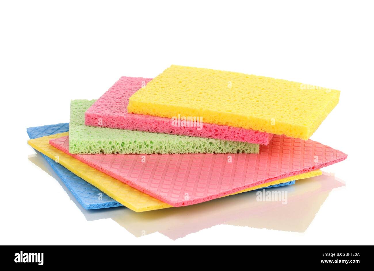 Cellulose sponges isolated on white Stock Photo - Alamy