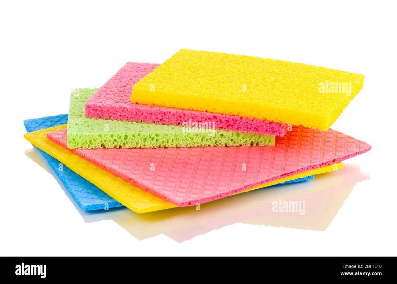 Cellulose sponges isolated on white Stock Photo - Alamy