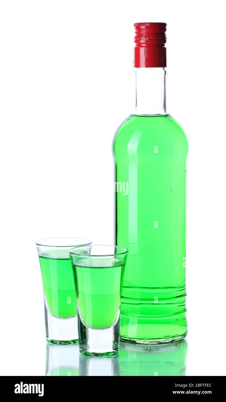 bottle and two glasses of absinthe isolated on white Stock Photo - Alamy