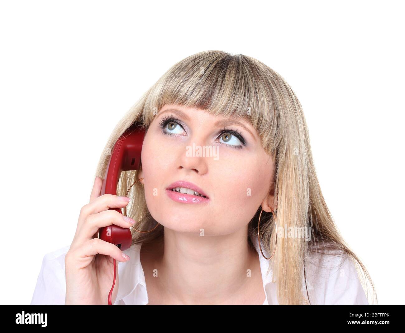 Beautiful young girl using telephone isolated on white Stock Photo - Alamy
