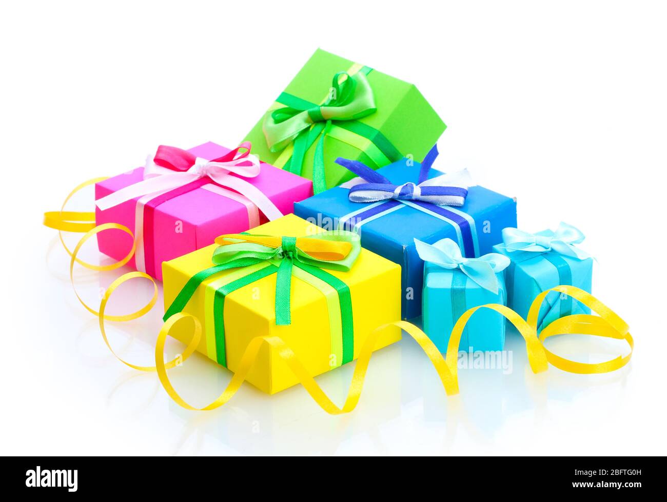 bright gifts with bows isolated on white Stock Photo - Alamy