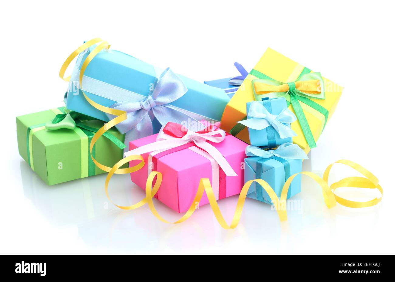 bright gifts with bows isolated on white Stock Photo - Alamy