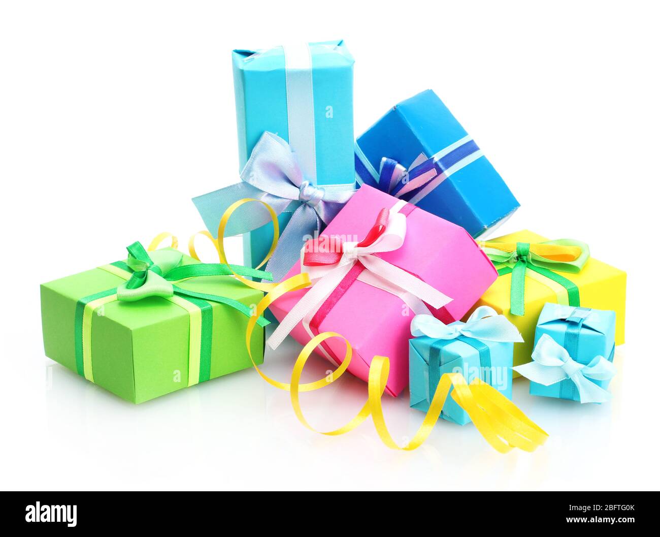 bright gifts with bows isolated on white Stock Photo - Alamy