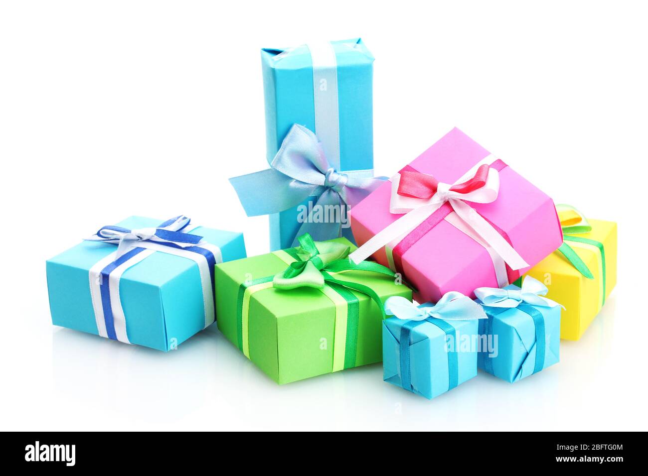 bright gifts with bows isolated on white Stock Photo - Alamy