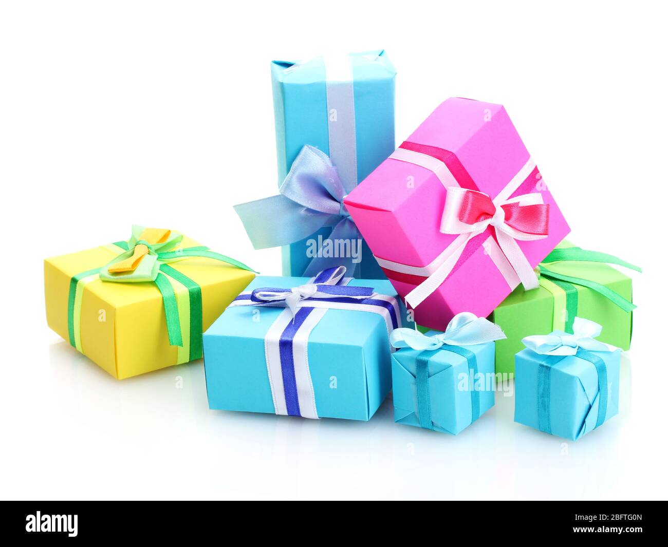 bright gifts with bows isolated on white Stock Photo - Alamy