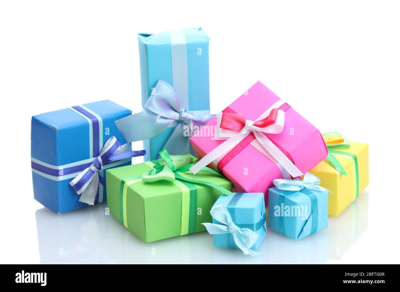 bright gifts with bows isolated on white Stock Photo - Alamy