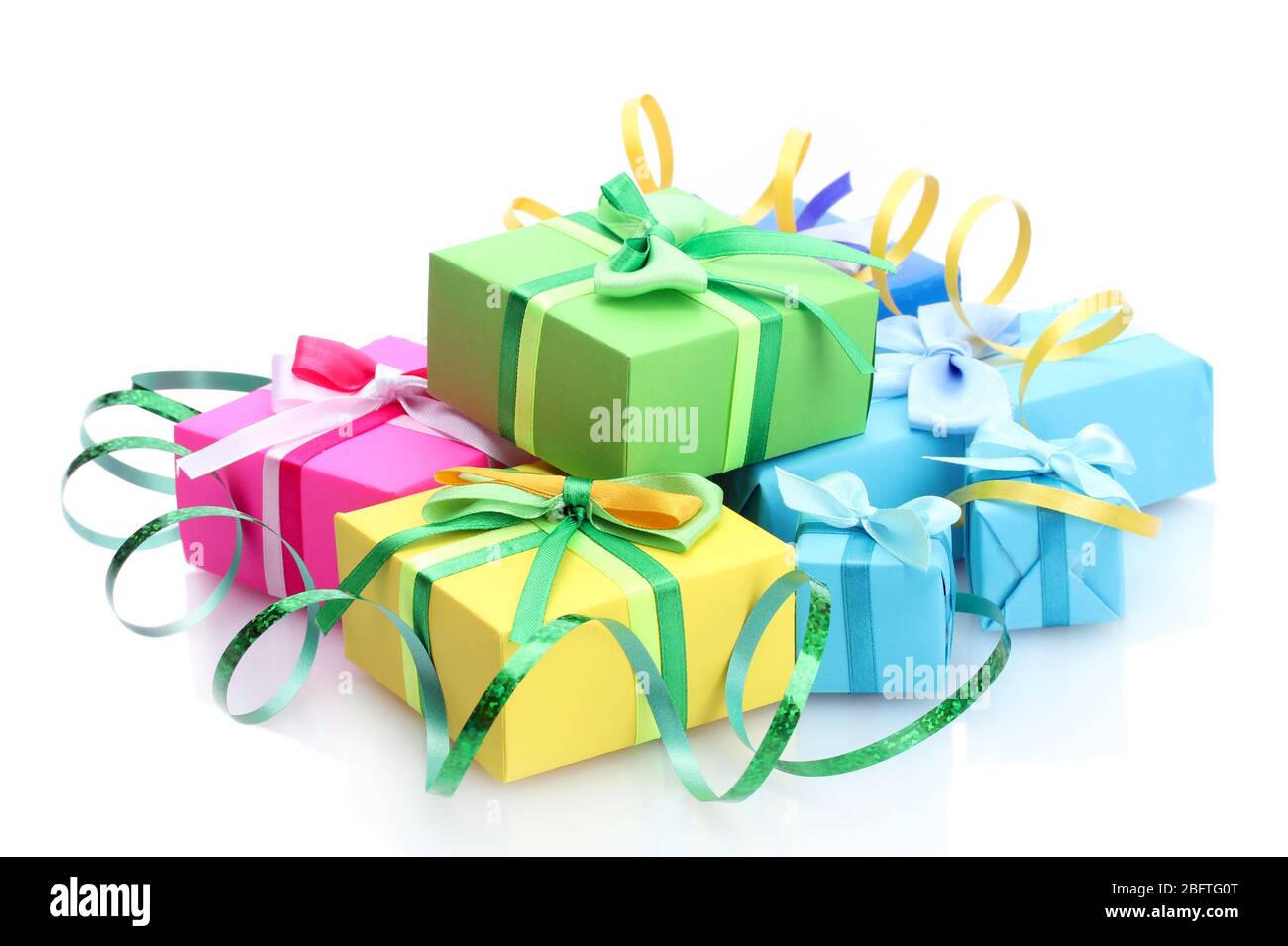 bright gifts with bows isolated on white Stock Photo - Alamy