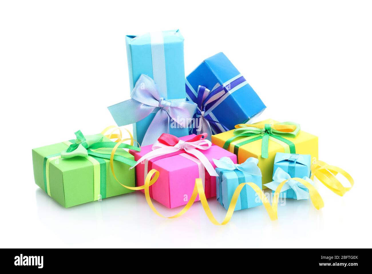 bright gifts with bows isolated on white Stock Photo - Alamy