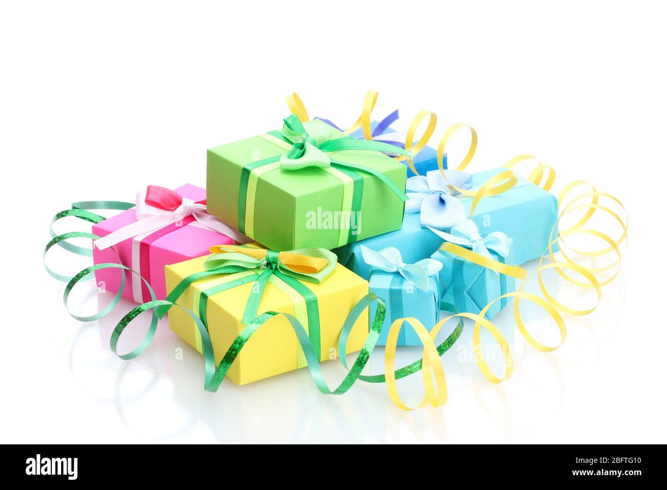 bright gifts with bows isolated on white Stock Photo - Alamy