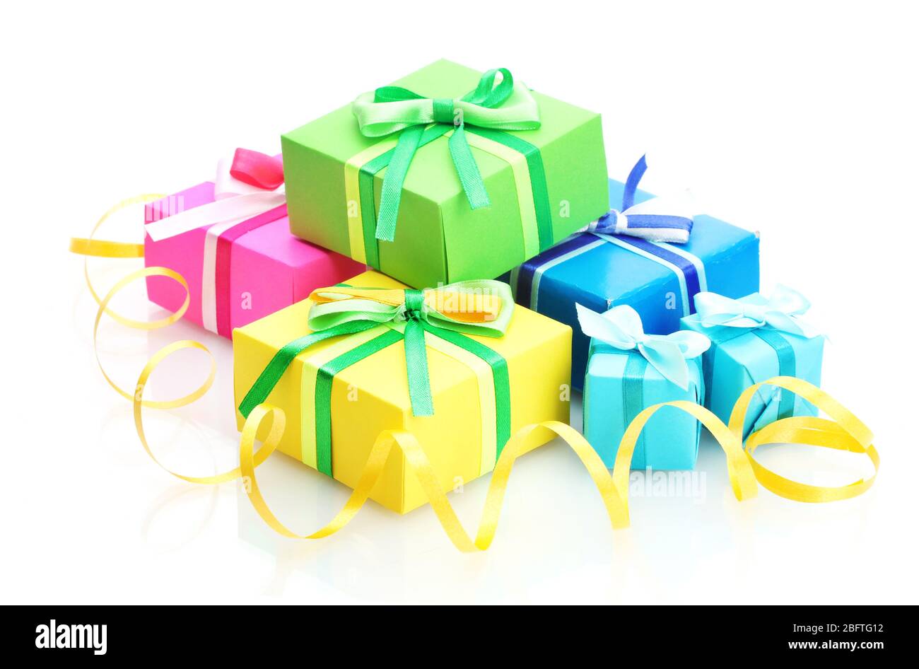 bright gifts with bows isolated on white Stock Photo - Alamy