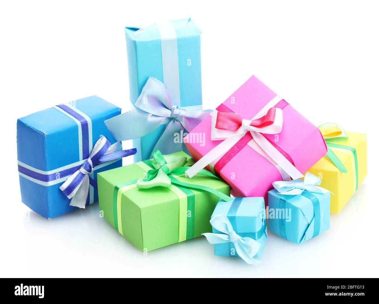 bright gifts with bows isolated on white Stock Photo - Alamy
