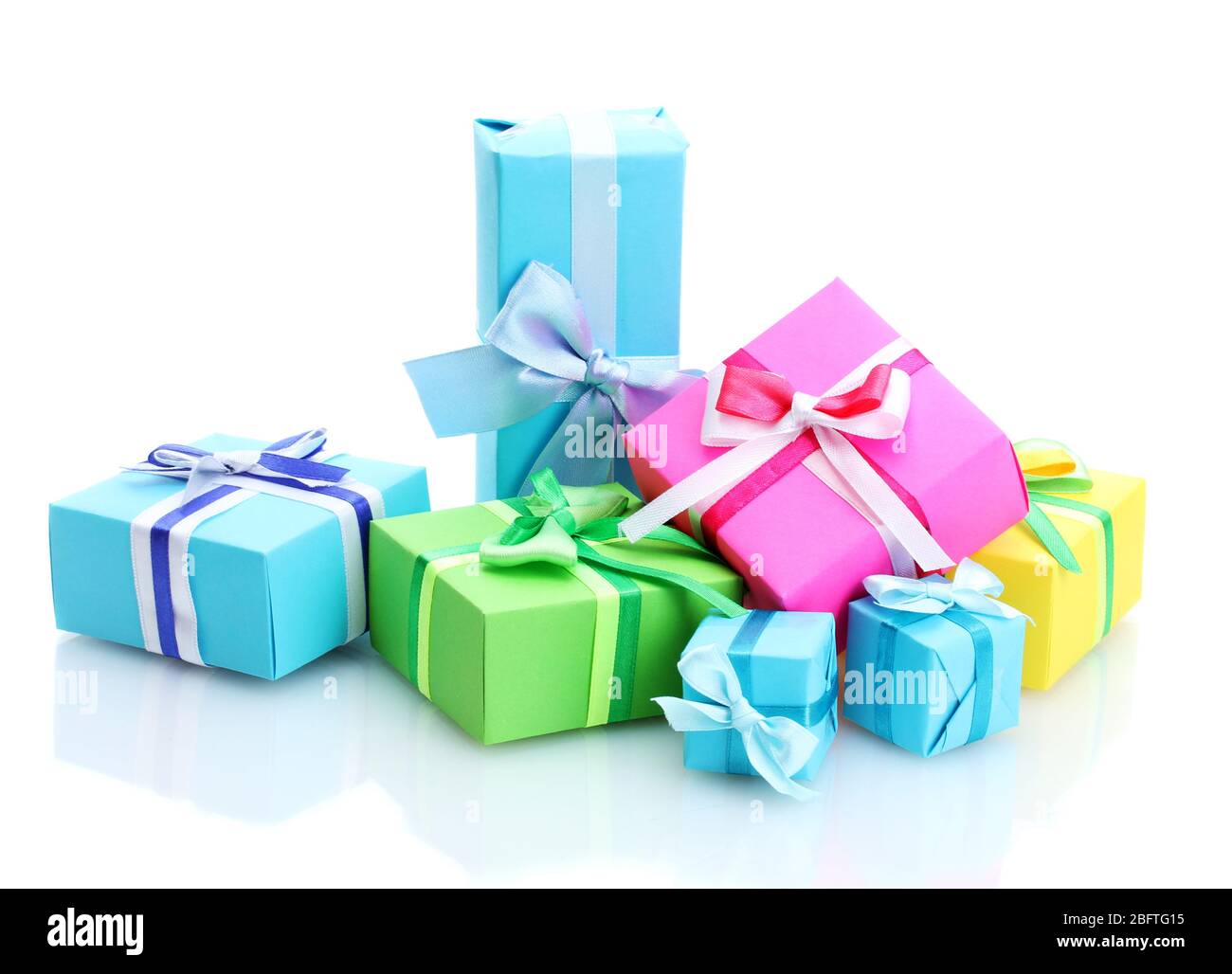 bright gifts with bows isolated on white Stock Photo - Alamy