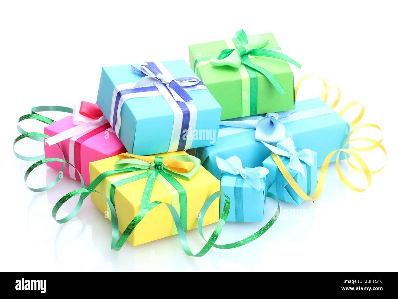 bright gifts with bows isolated on white Stock Photo - Alamy