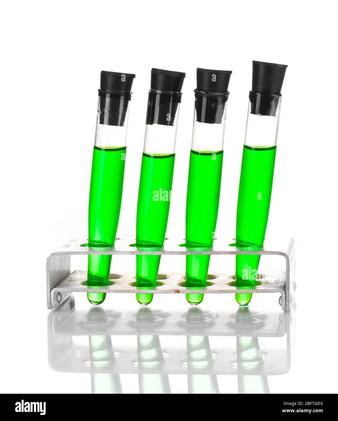 Test-tubes with green liquid isolated on white Stock Photo - Alamy