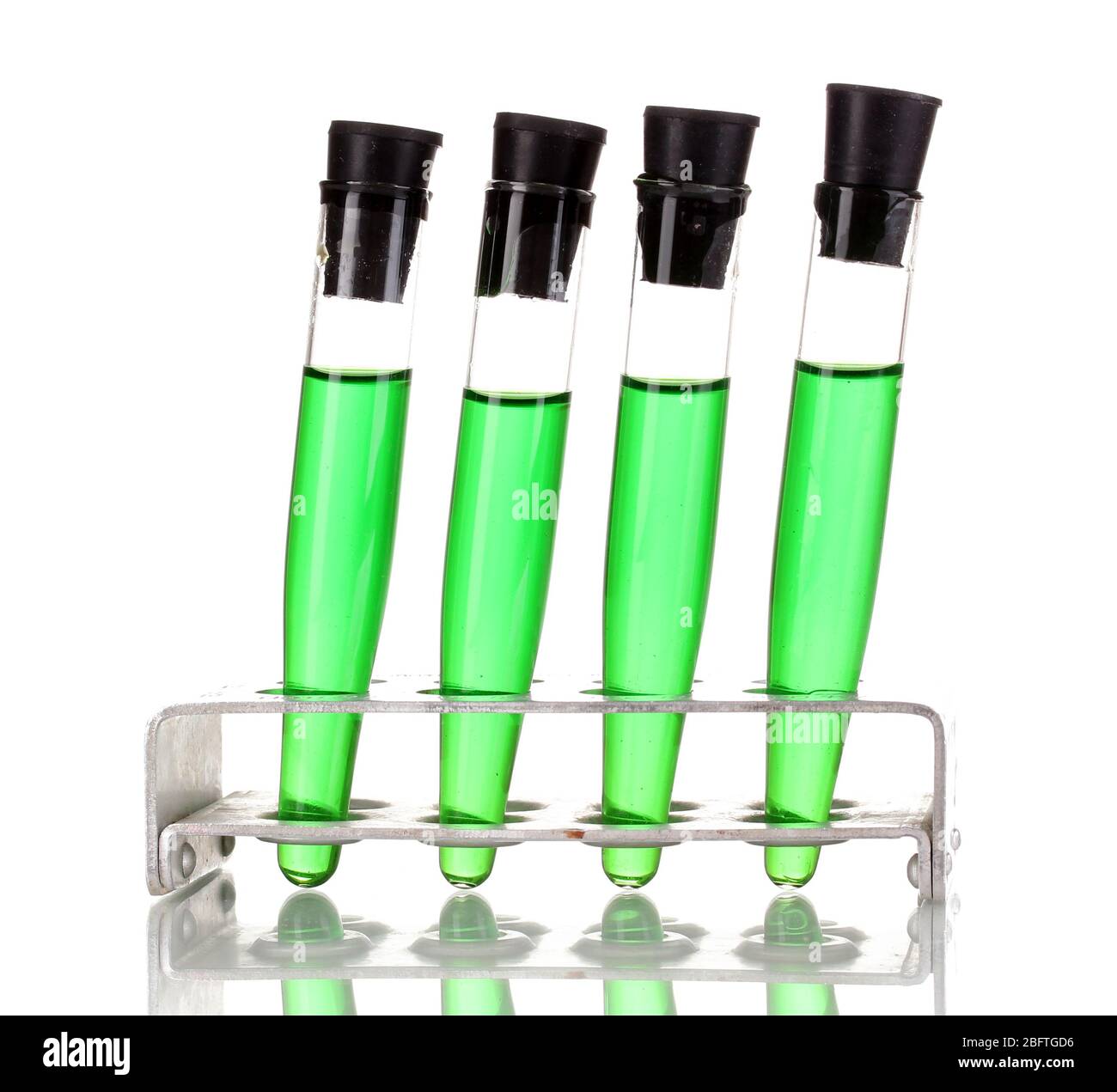 Test-tubes with green liquid isolated on white Stock Photo - Alamy