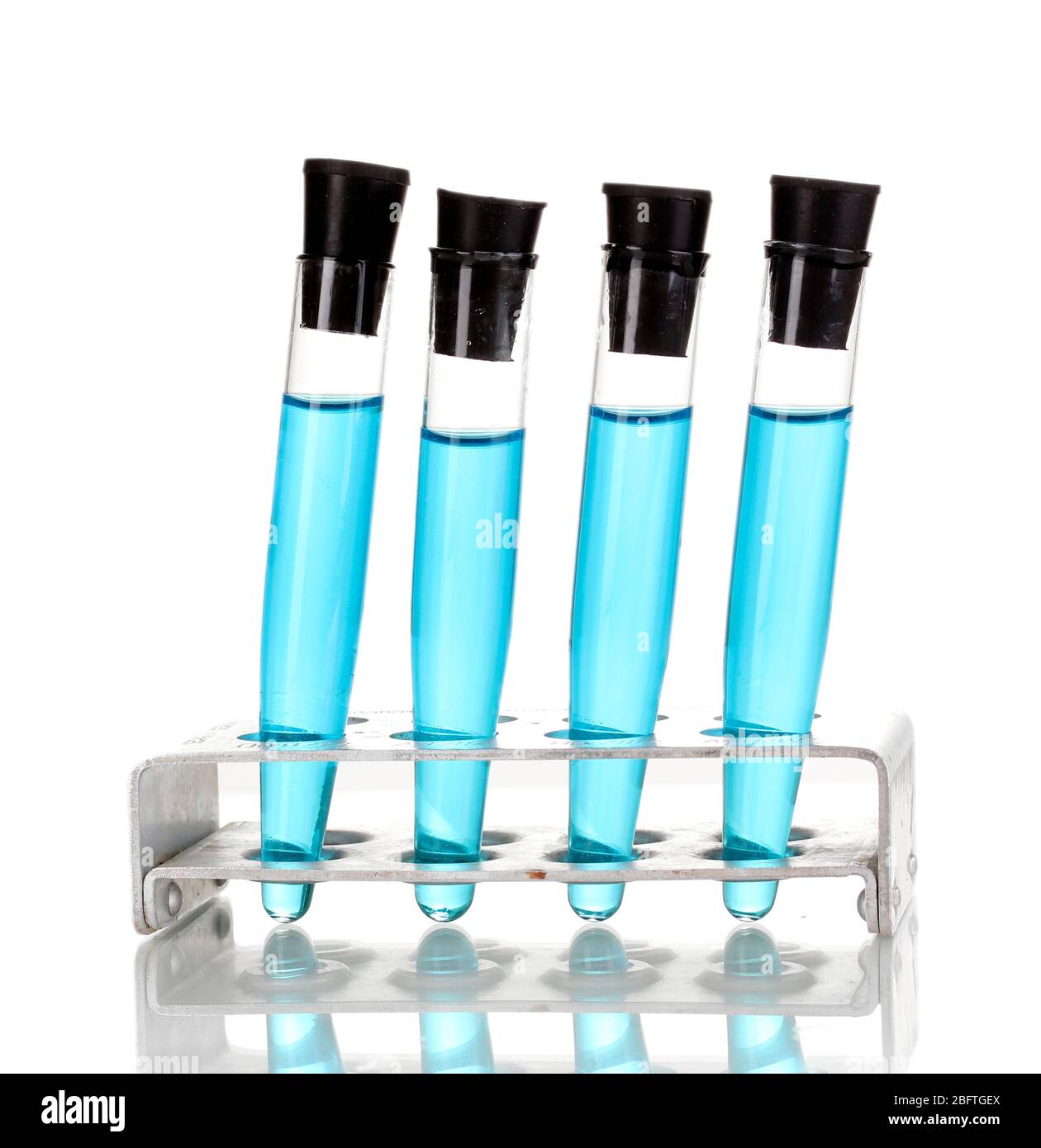 Test-tubes with blue liquid isolated on white Stock Photo - Alamy