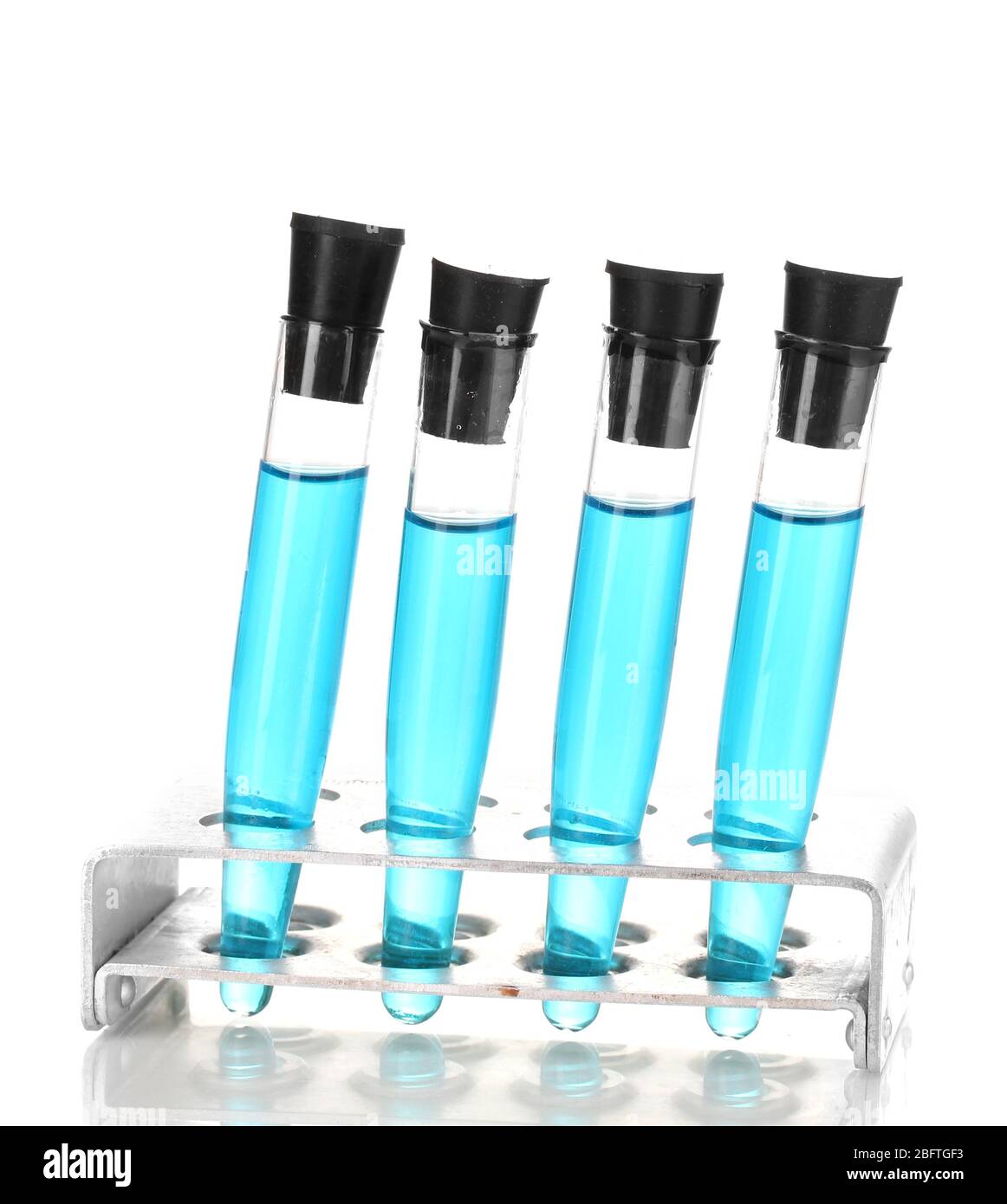 Test-tubes with blue liquid isolated on white Stock Photo - Alamy