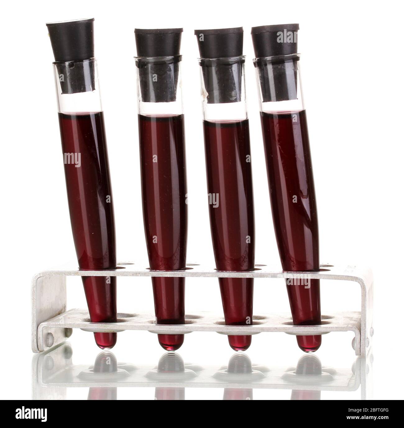 Test-tubes with brown liquid isolated on white Stock Photo - Alamy