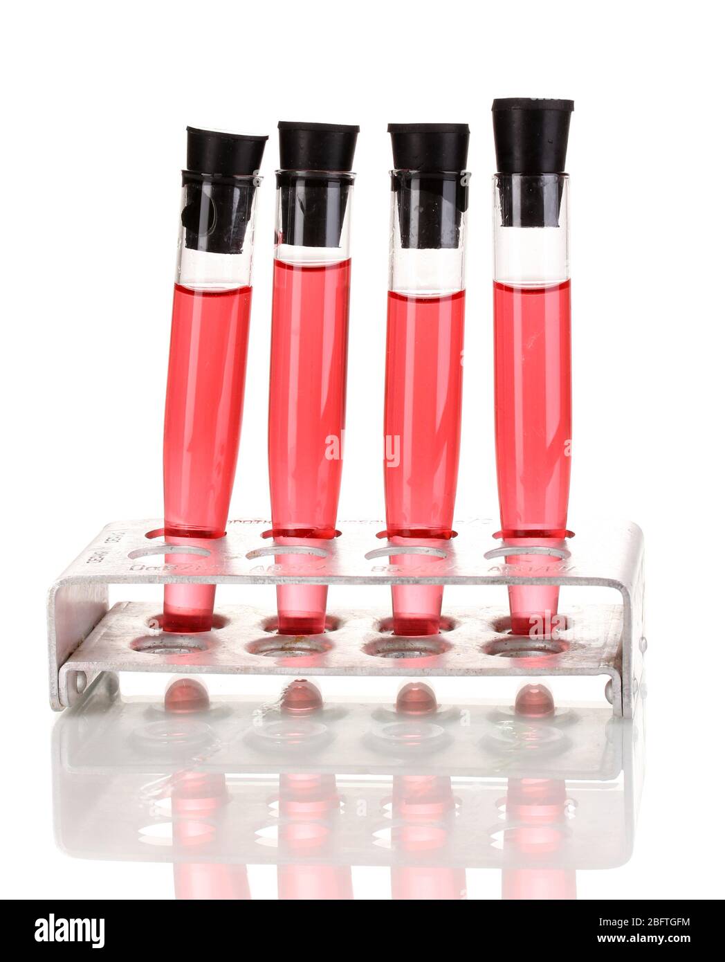 Test-tubes with red liquid isolated on white Stock Photo - Alamy