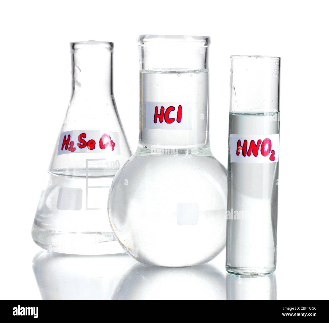 Test-tubes with various acids isolated on white Stock Photo - Alamy