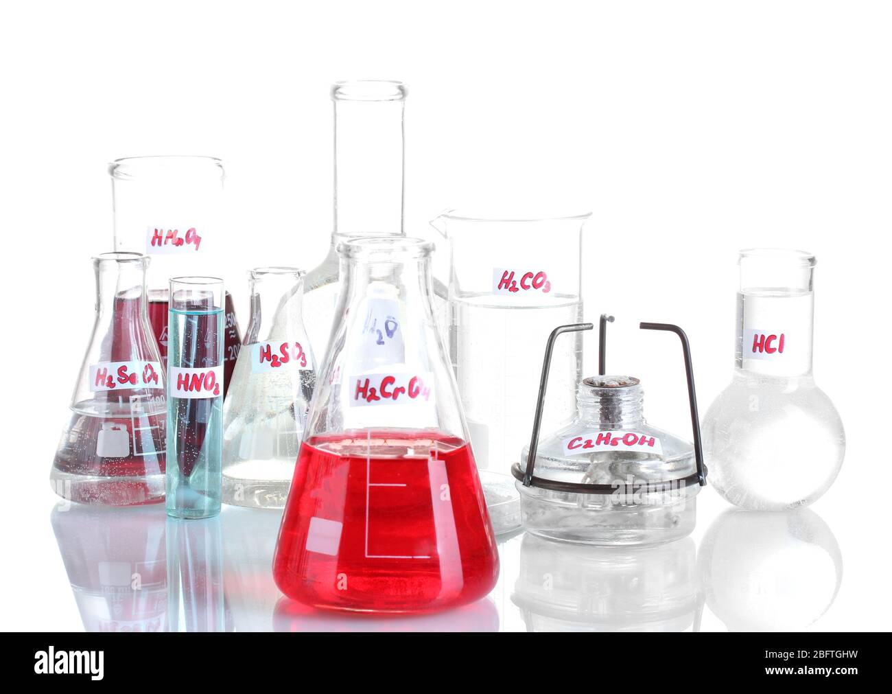 Test-tubes with various acids and chemicals isolated on white Stock ...