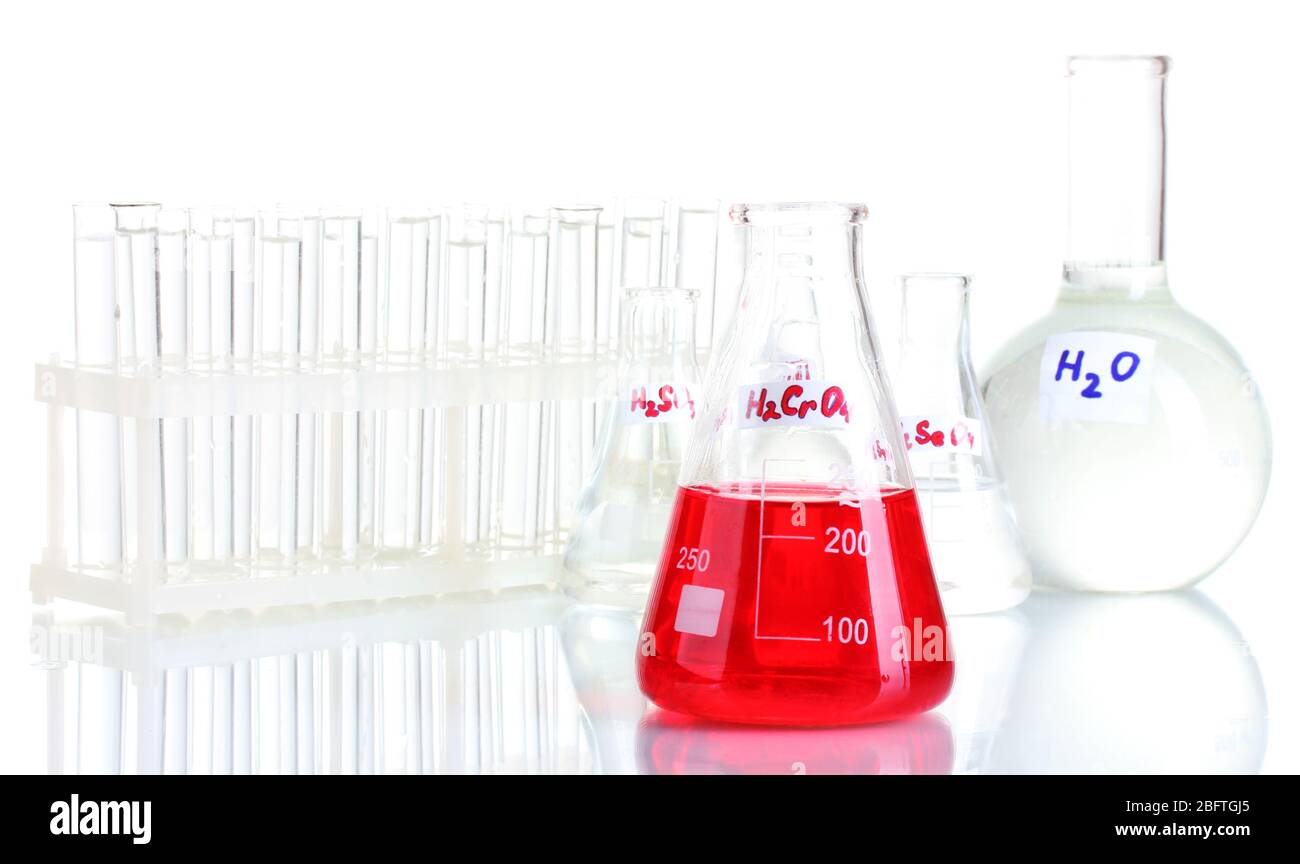 Test-tubes with various acids isolated on white Stock Photo - Alamy