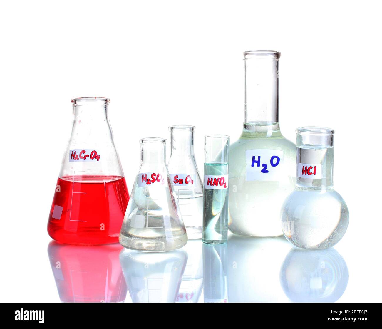 Test-tubes with various acids isolated on white Stock Photo - Alamy