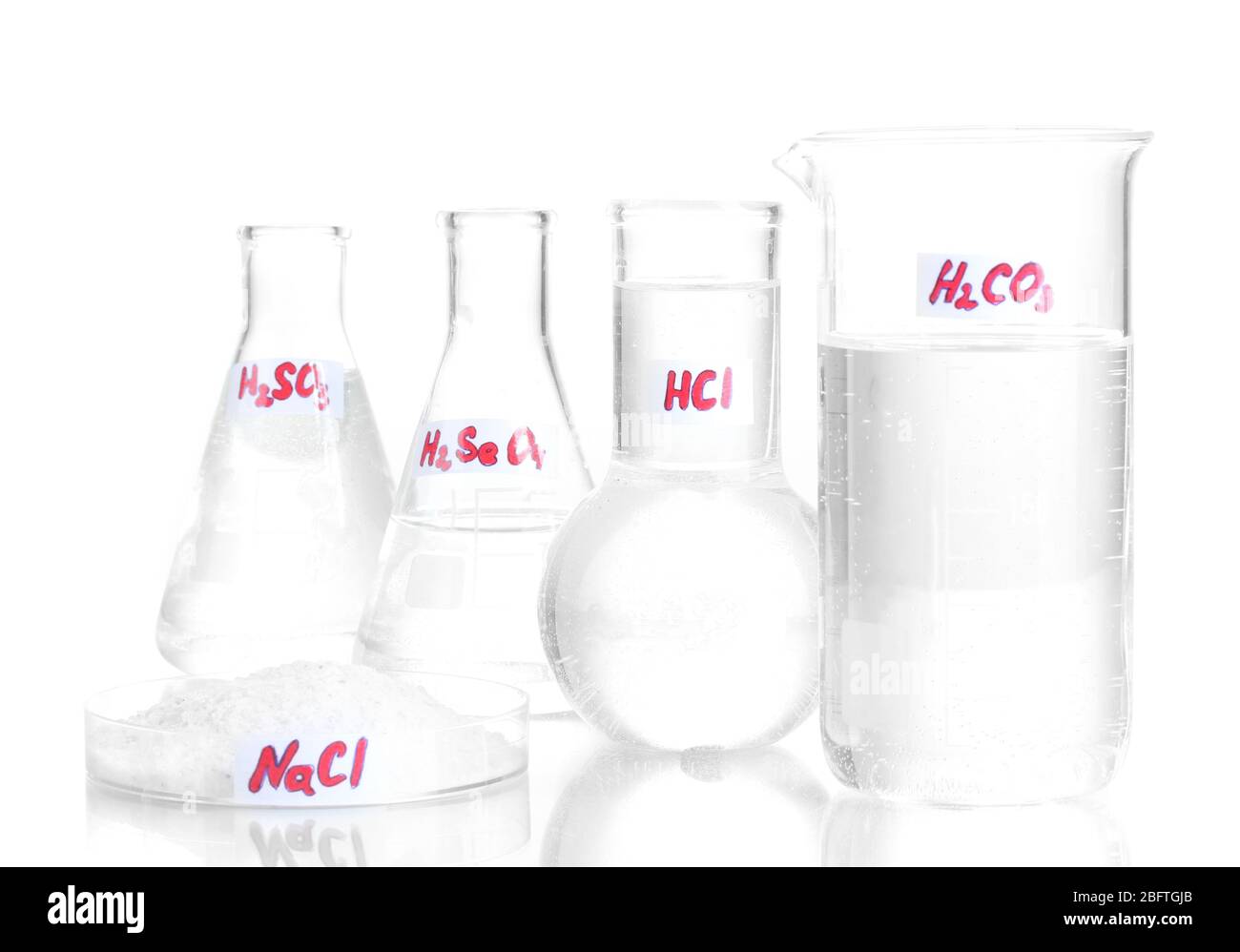 Test-tubes with various acids and chemicals isolated on white Stock ...