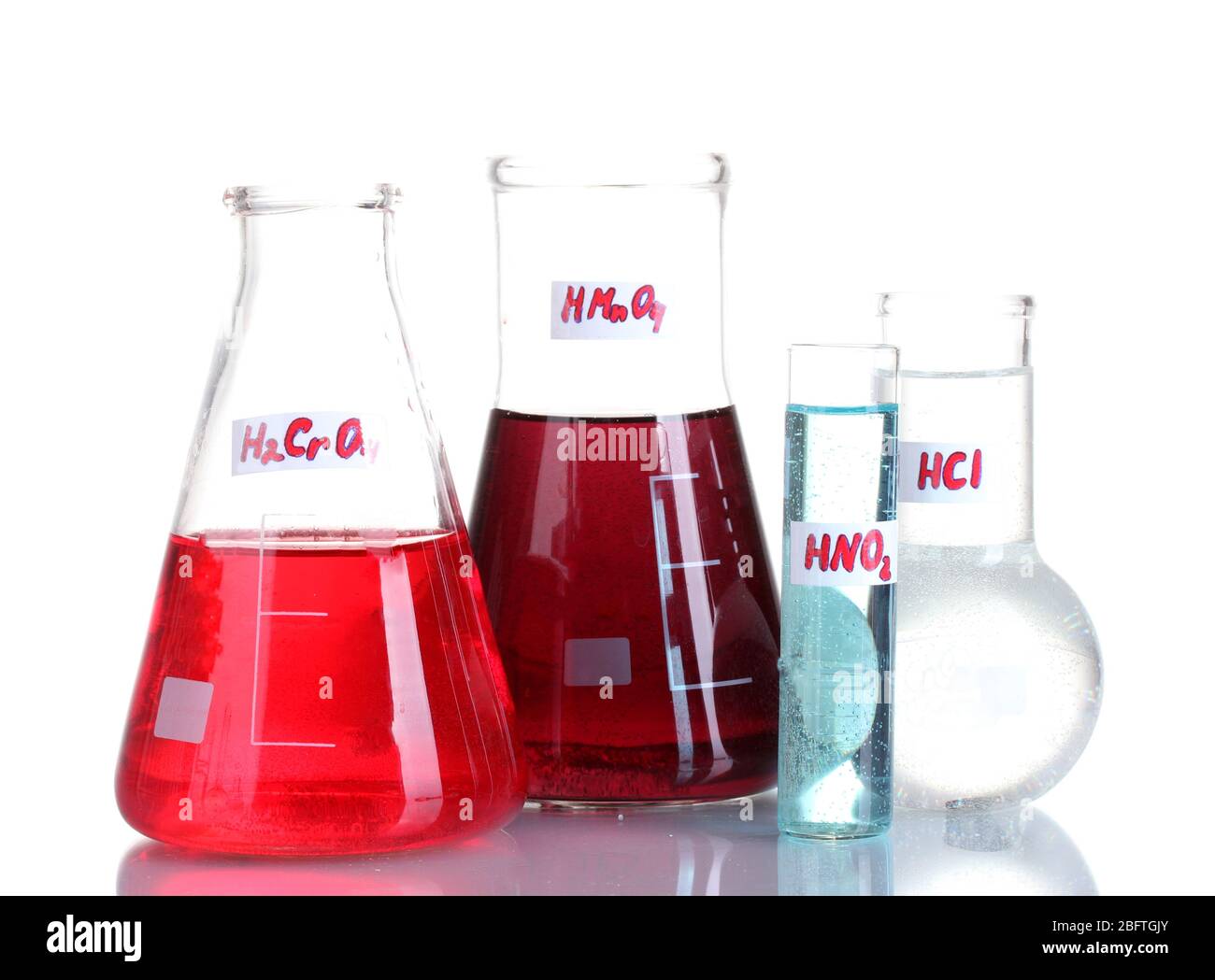 Test-tubes with various acids and chemicals isolated on white Stock ...
