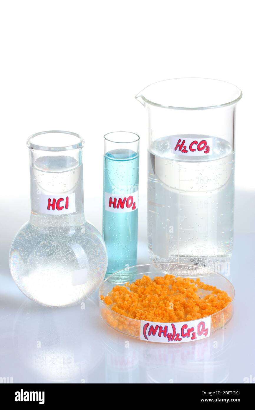 Test-tubes with various acids and chemicals isolated on white Stock ...