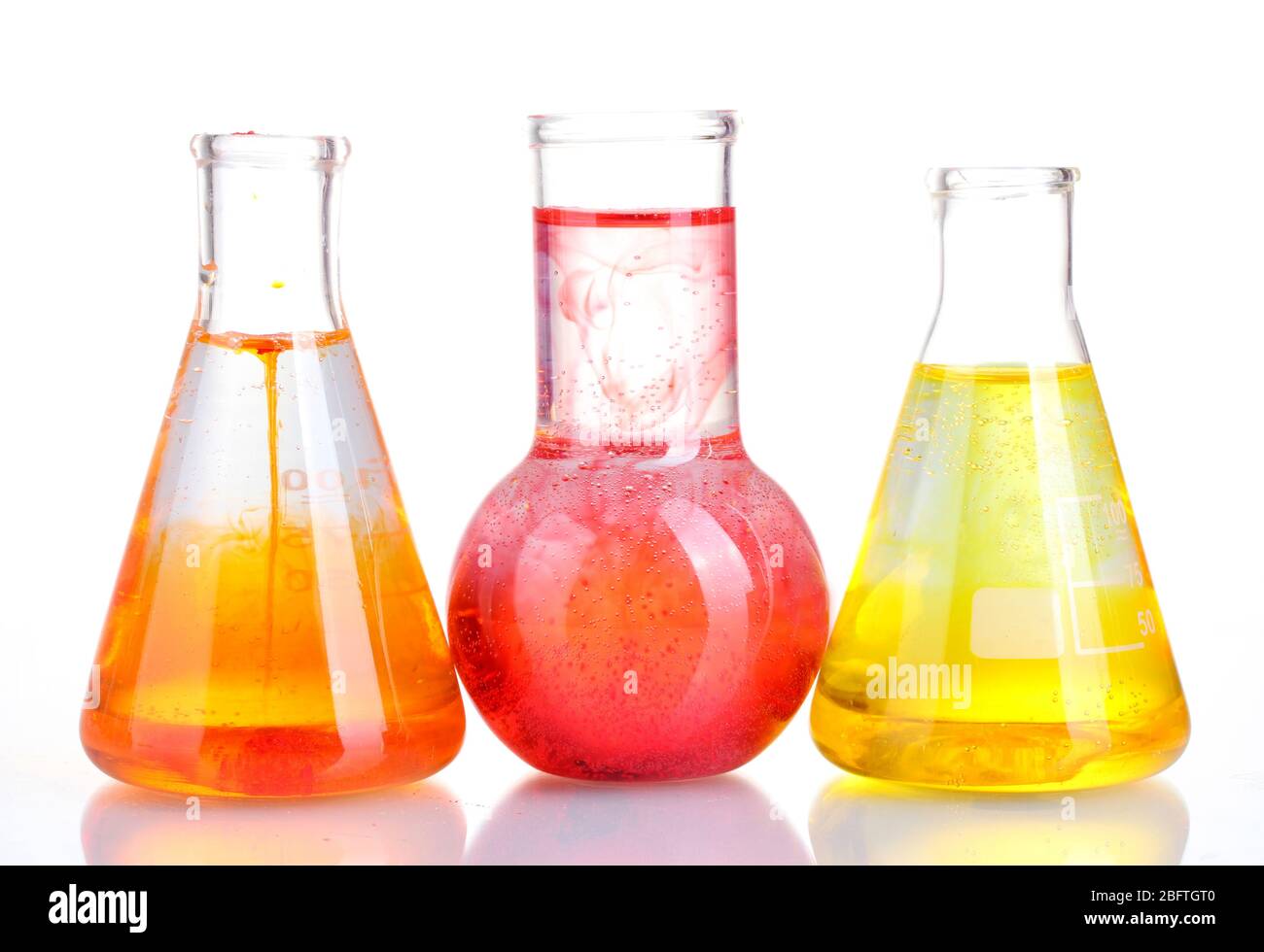 brightly ink in a flask with water isolated on white Stock Photo - Alamy