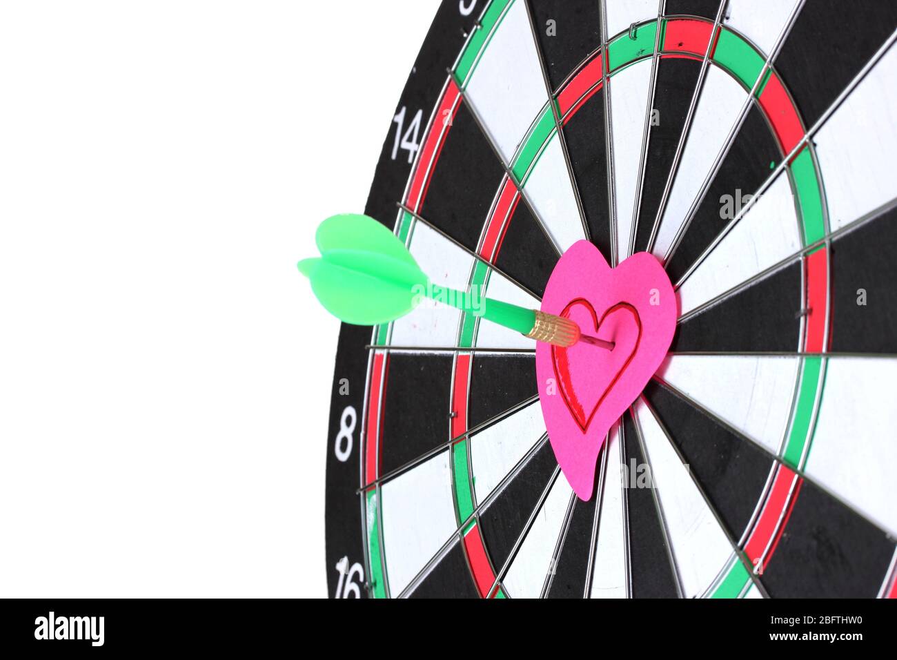 Darts with stickers depicting the life values close-up on white ...